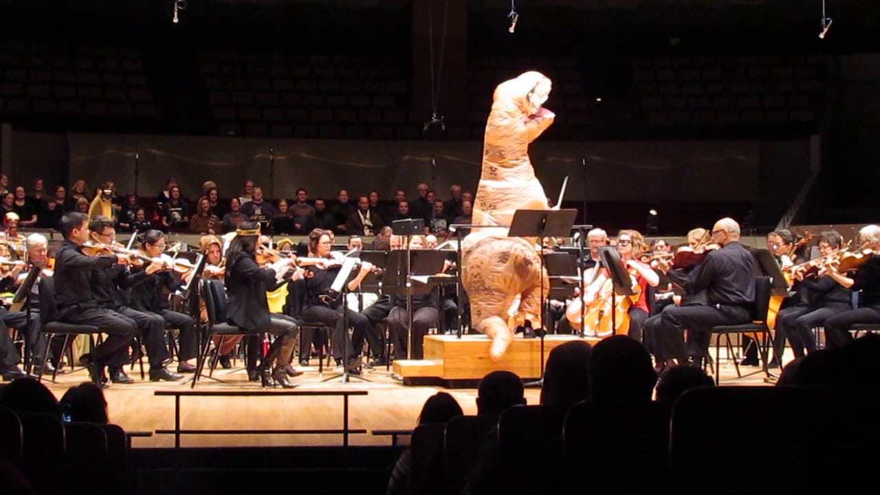 This orchestra is conducted by a dinosaur - Slippedisc